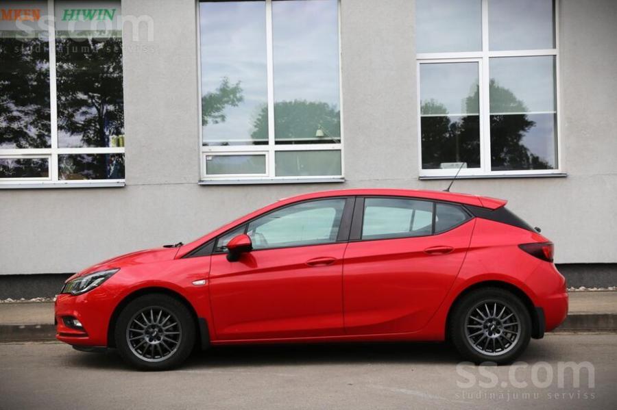 Red Opel Astra 2017 in Riga, with an engine capacity of 1.40 L and mileage of 141 thousand km for 7195 €, photo 3 on AUTOMOTO.COM.LV