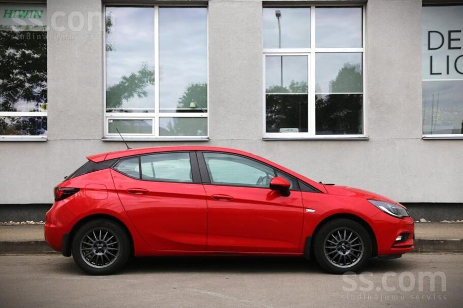 Red Opel Astra 2017 in Riga, with an engine capacity of 1.40 L and mileage of 141 thousand km for 7195 €, photo 4 on AUTOMOTO.COM.LV