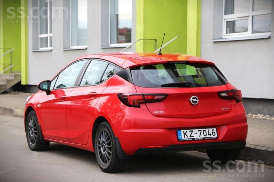 Red Opel Astra 2017 in Riga, with an engine capacity of 1.40 L and mileage of 141 thousand km for 7195 €, photo 7 on AUTOMOTO.COM.LV