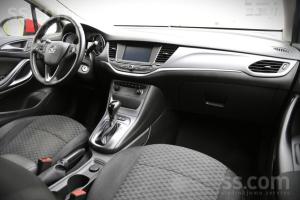 Red Opel Astra 2017 in Riga, with an engine capacity of 1.40 L and mileage of 141 thousand km for 7195 €, photo 11 on AUTOMOTO.COM.LV