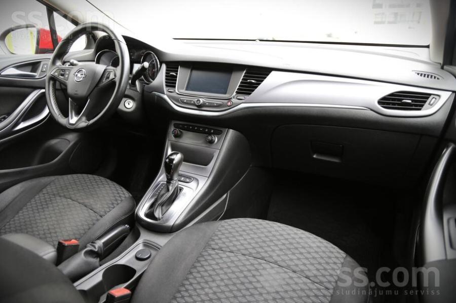 Red Opel Astra 2017 in Riga, with an engine capacity of 1.40 L and mileage of 141 thousand km for 7195 €, photo 11 on AUTOMOTO.COM.LV