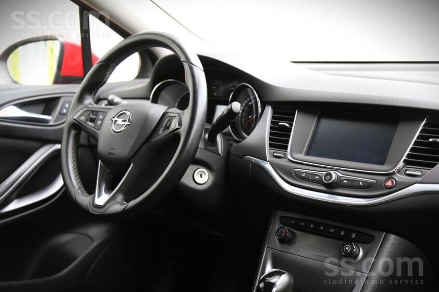 Red Opel Astra 2017 in Riga, with an engine capacity of 1.40 L and mileage of 141 thousand km for 7195 €, photo 12 on AUTOMOTO.COM.LV