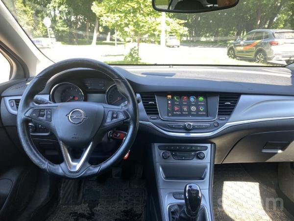 Red Opel Astra 2017 in Riga, with an engine capacity of 1.40 L and mileage of 124 thousand km for 6800 €, photo 6 on AUTOMOTO.COM.LV