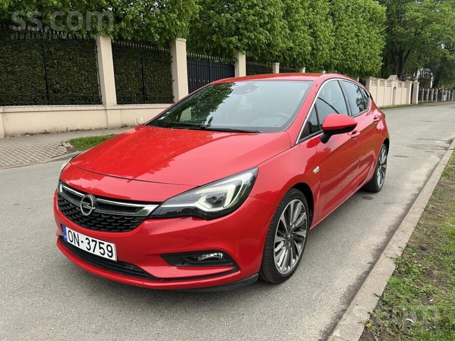 Red Opel Astra 2017 in Riga, with an engine capacity of 1.60 L and mileage of 195 thousand km for 7950 €, photo 1 on AUTOMOTO.COM.LV