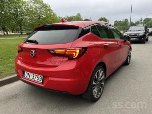 Red Opel Astra 2017 in Riga, with an engine capacity of 1.60 L and mileage of 195 thousand km for 7950 €, photo 4 on AUTOMOTO.COM.LV