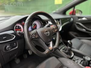 Red Opel Astra 2017 in Riga, with an engine capacity of 1.60 L and mileage of 195 thousand km for 7950 €, photo 7 on AUTOMOTO.COM.LV