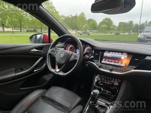 Red Opel Astra 2017 in Riga, with an engine capacity of 1.60 L and mileage of 195 thousand km for 7950 €, photo 8 on AUTOMOTO.COM.LV