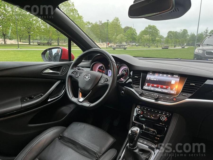 Red Opel Astra 2017 in Riga, with an engine capacity of 1.60 L and mileage of 195 thousand km for 7950 €, photo 8 on AUTOMOTO.COM.LV