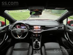 Red Opel Astra 2017 in Riga, with an engine capacity of 1.60 L and mileage of 195 thousand km for 7950 €, photo 12 on AUTOMOTO.COM.LV