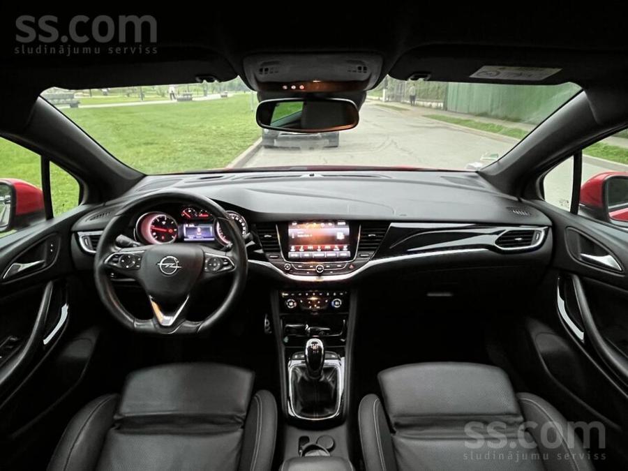 Red Opel Astra 2017 in Riga, with an engine capacity of 1.60 L and mileage of 195 thousand km for 7950 €, photo 12 on AUTOMOTO.COM.LV