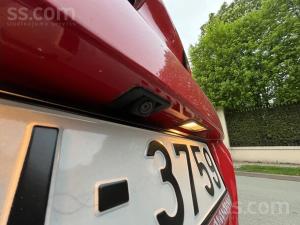 Red Opel Astra 2017 in Riga, with an engine capacity of 1.60 L and mileage of 195 thousand km for 7950 €, photo 13 on AUTOMOTO.COM.LV
