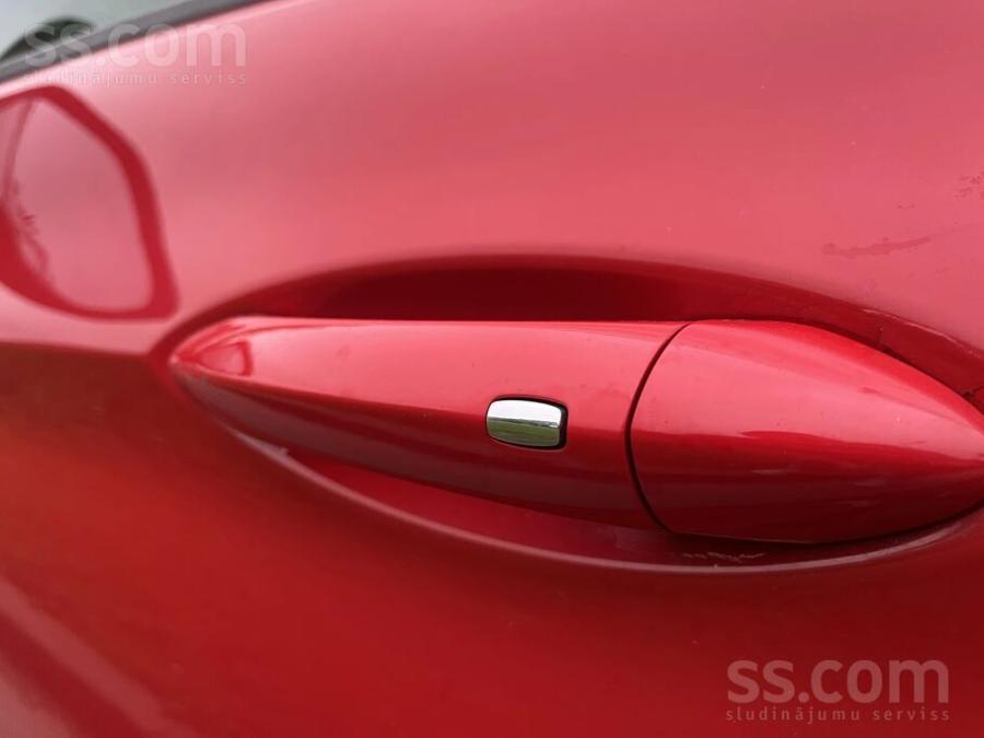 Red Opel Astra 2017 in Riga, with an engine capacity of 1.60 L and mileage of 195 thousand km for 7950 €, photo 14 on AUTOMOTO.COM.LV