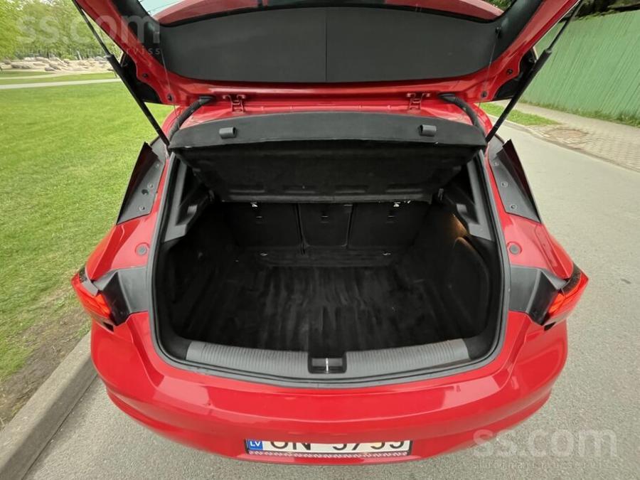 Red Opel Astra 2017 in Riga, with an engine capacity of 1.60 L and mileage of 195 thousand km for 7950 €, photo 15 on AUTOMOTO.COM.LV
