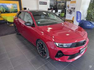 Red Opel Astra 2023 in Vilnius, with an engine capacity of 1.20 L and mileage of 74 thousand km for 17444 €, photo 8 on AUTOMOTO.COM.LV