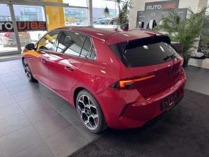 Red Opel Astra 2023 in Vilnius, with an engine capacity of 1.20 L and mileage of 74 thousand km for 17444 €, photo 9 on AUTOMOTO.COM.LV