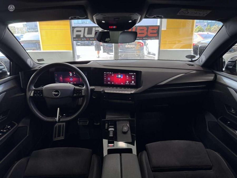 Red Opel Astra 2023 in Vilnius, with an engine capacity of 1.20 L and mileage of 74 thousand km for 17444 €, photo 14 on AUTOMOTO.COM.LV