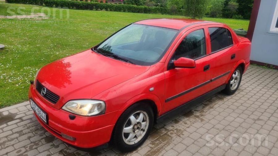 Red Opel Astra 2001 in Balvi, with an engine capacity of 1.80 L and mileage of 210 thousand km for 650 €, photo 1 on AUTOMOTO.COM.LV