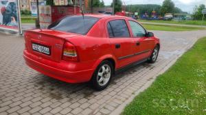 Red Opel Astra 2001 in Balvi, with an engine capacity of 1.80 L and mileage of 210 thousand km for 650 €, photo 3 on AUTOMOTO.COM.LV