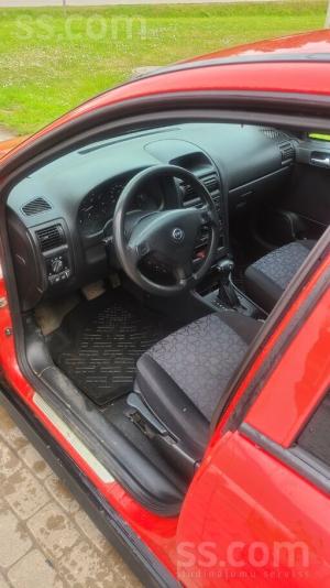 Red Opel Astra 2001 in Balvi, with an engine capacity of 1.80 L and mileage of 210 thousand km for 650 €, photo 4 on AUTOMOTO.COM.LV