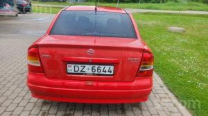 Red Opel Astra 2001 in Balvi, with an engine capacity of 1.80 L and mileage of 210 thousand km for 650 €, photo 6 on AUTOMOTO.COM.LV
