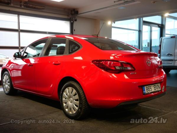 Red Opel Astra 2017 in Tallinn, with an engine capacity of 1.60 L and mileage of 161 thousand km for 6490 €, photo 4 on AUTOMOTO.COM.LV
