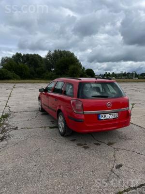 Red Opel Astra 2006 in Riga, with an engine capacity of 1.90 L and mileage of 360 thousand km for 1300 €, photo 5 on AUTOMOTO.COM.LV