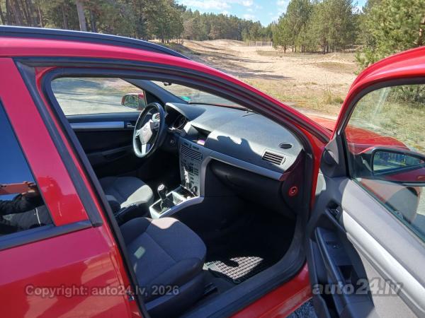 Sarkans Opel Astra 2009 Tallina, ar dzinēja tilpumu 1.80 L un nobraukumu 265 tūkst. km par 1500 €, foto 2 vietnē AUTOMOTO.COM.LV