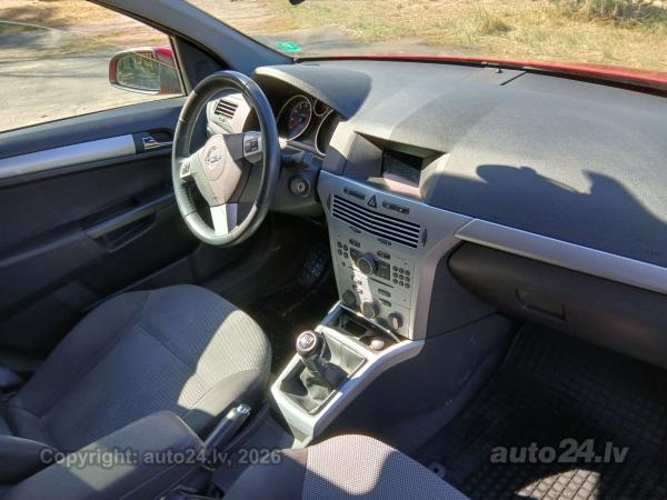 Sarkans Opel Astra 2009 Tallina, ar dzinēja tilpumu 1.80 L un nobraukumu 265 tūkst. km par 1500 €, foto 3 vietnē AUTOMOTO.COM.LV