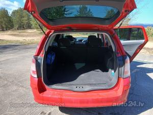 Sarkans Opel Astra 2009 Tallina, ar dzinēja tilpumu 1.80 L un nobraukumu 265 tūkst. km par 1500 €, foto 6 vietnē AUTOMOTO.COM.LV