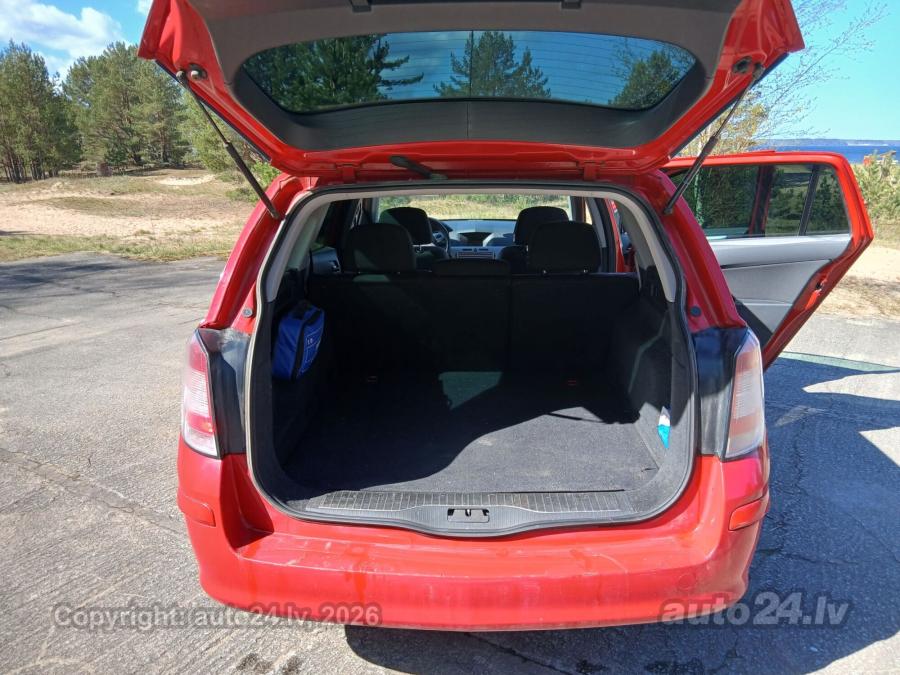 Sarkans Opel Astra 2009 Tallina, ar dzinēja tilpumu 1.80 L un nobraukumu 265 tūkst. km par 1500 €, foto 6 vietnē AUTOMOTO.COM.LV