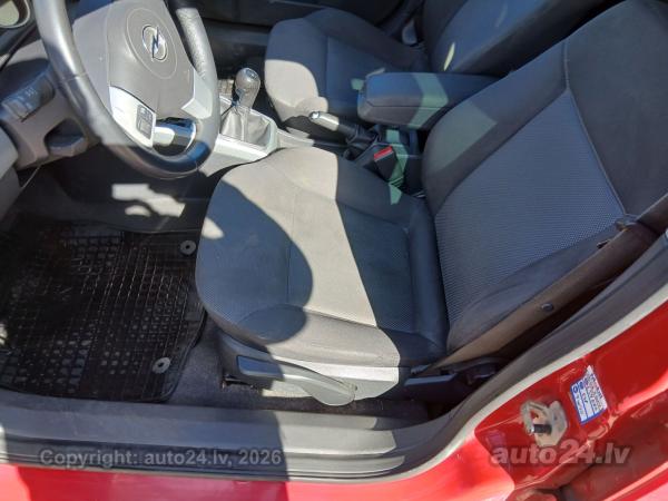 Sarkans Opel Astra 2009 Tallina, ar dzinēja tilpumu 1.80 L un nobraukumu 265 tūkst. km par 1500 €, foto 7 vietnē AUTOMOTO.COM.LV