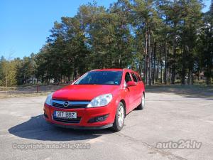 Sarkans Opel Astra 2009 Tallina, ar dzinēja tilpumu 1.80 L un nobraukumu 265 tūkst. km par 1500 €, foto 11 vietnē AUTOMOTO.COM.LV