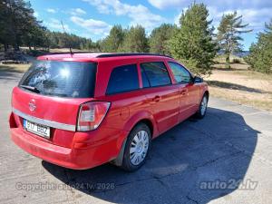 Sarkans Opel Astra 2009 Tallina, ar dzinēja tilpumu 1.80 L un nobraukumu 265 tūkst. km par 1500 €, foto 12 vietnē AUTOMOTO.COM.LV