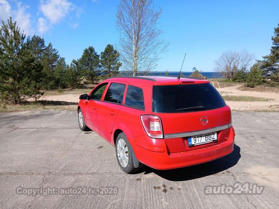 Sarkans Opel Astra 2009 Tallina, ar dzinēja tilpumu 1.80 L un nobraukumu 265 tūkst. km par 1500 €, foto 13 vietnē AUTOMOTO.COM.LV