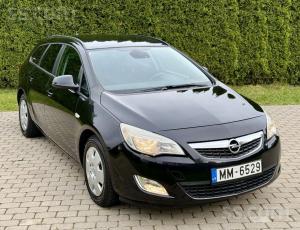 Sarkans Opel Astra 2011 Rīga, ar dzinēja tilpumu 1.30 L un nobraukumu 358 tūkst. km par 1990 €, foto  vietnē AUTOMOTO.COM.LV