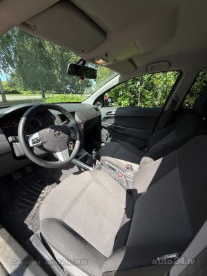 Sarkans Opel Astra 2012 Tallina, ar dzinēja tilpumu 1.60 L un nobraukumu 197 tūkst. km par 2000 €, foto 7 vietnē AUTOMOTO.COM.LV