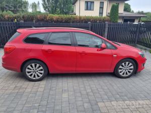 Red Opel Astra 2013 in Riga, with an engine capacity of 2.00 L and mileage of 252 thousand km for 2200 €, photo  on AUTOMOTO.COM.LV