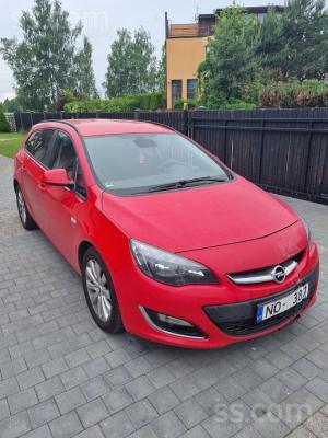 Red Opel Astra 2013 in Riga, with an engine capacity of 2.00 L and mileage of 252 thousand km for 2200 €, photo 3 on AUTOMOTO.COM.LV