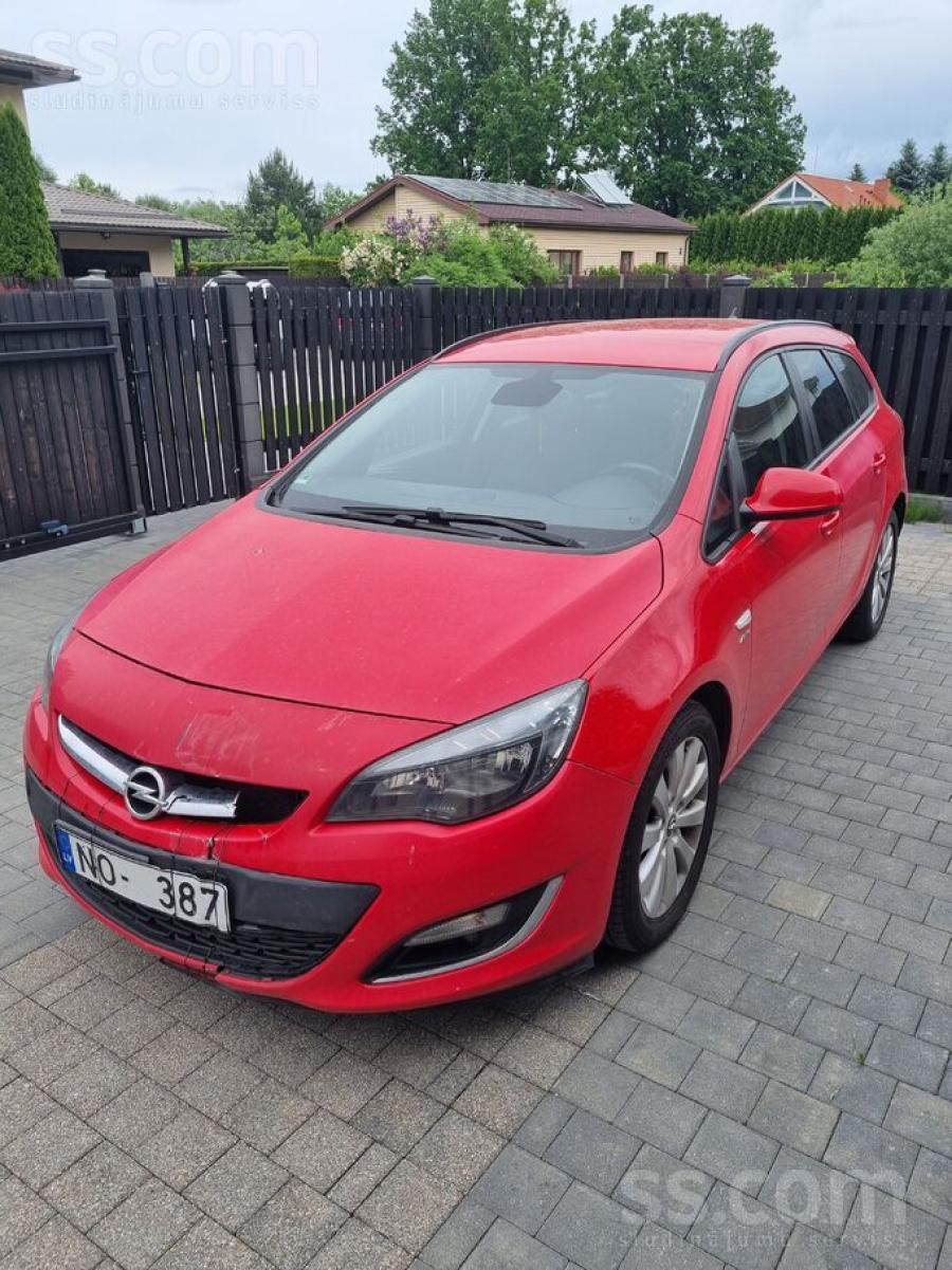 Red Opel Astra 2013 in Riga, with an engine capacity of 2.00 L and mileage of 252 thousand km for 2200 €, photo 4 on AUTOMOTO.COM.LV