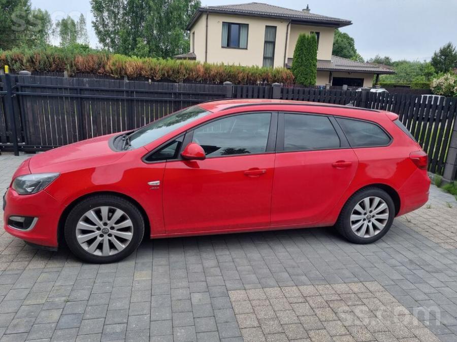Red Opel Astra 2013 in Riga, with an engine capacity of 2.00 L and mileage of 252 thousand km for 2200 €, photo 5 on AUTOMOTO.COM.LV