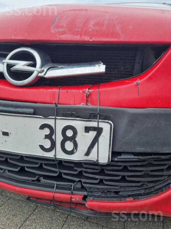 Red Opel Astra 2013 in Riga, with an engine capacity of 2.00 L and mileage of 252 thousand km for 2200 €, photo 6 on AUTOMOTO.COM.LV