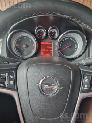 Red Opel Astra 2013 in Riga, with an engine capacity of 2.00 L and mileage of 252 thousand km for 2200 €, photo 10 on AUTOMOTO.COM.LV