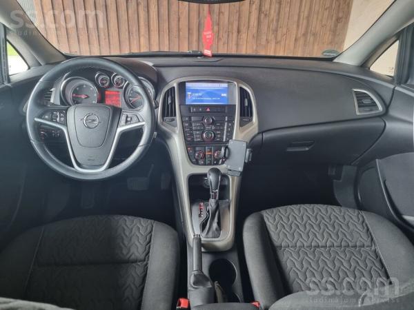 Red Opel Astra 2013 in Riga, with an engine capacity of 2.00 L and mileage of 252 thousand km for 2200 €, photo 10 on AUTOMOTO.COM.LV