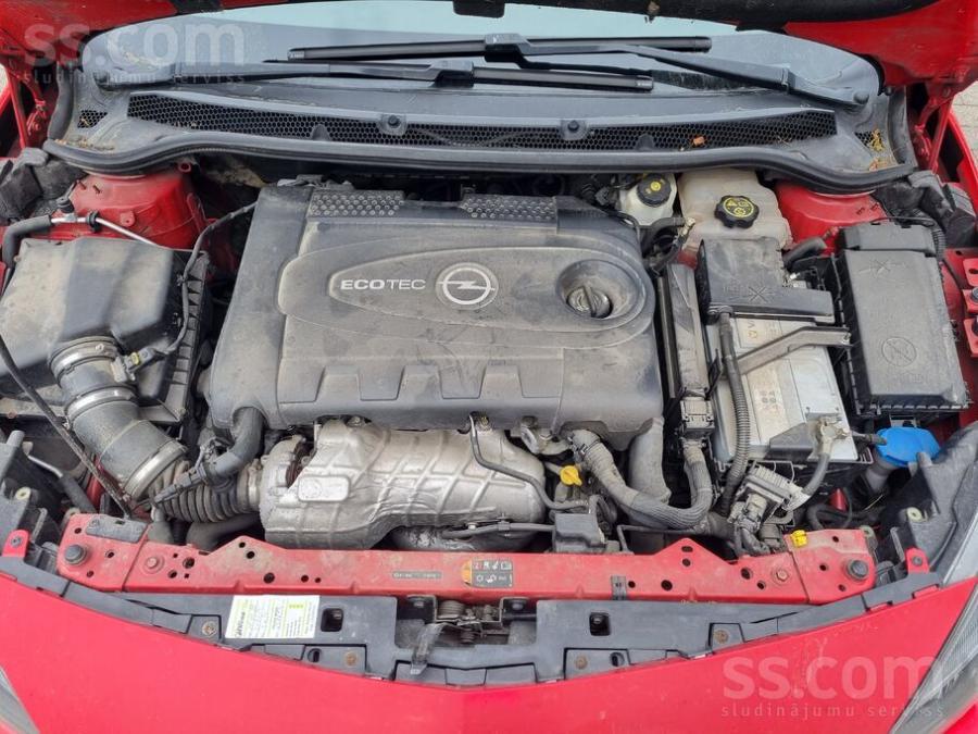 Red Opel Astra 2013 in Riga, with an engine capacity of 2.00 L and mileage of 252 thousand km for 2200 €, photo 12 on AUTOMOTO.COM.LV