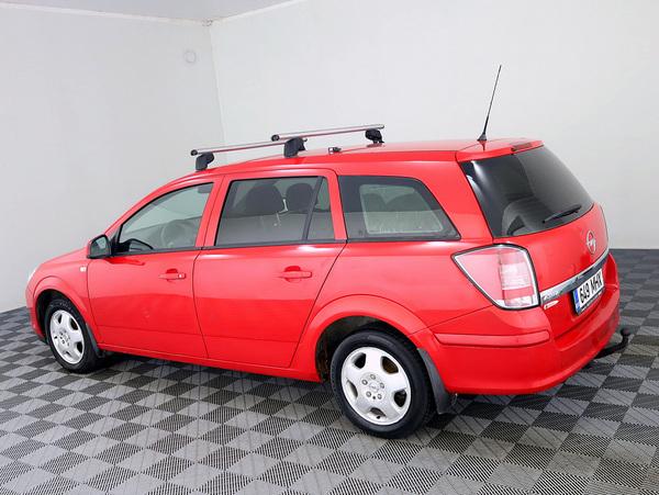 Red Opel Astra 2013 in Tallinn, with an engine capacity of 1.60 L and mileage of 243 thousand km for 1699 €, photo 4 on AUTOMOTO.COM.LV
