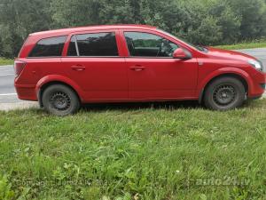 Red Opel Astra 2013 in Tallinn, with an engine capacity of 1.60 L and mileage of 409 thousand km for 1999 €, photo 5 on AUTOMOTO.COM.LV