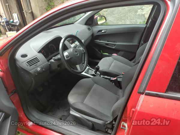 Sarkans Opel Astra 2013 Tallina, ar dzinēja tilpumu 1.60 L un nobraukumu 409 tūkst. km par 1999 €, foto 6 vietnē AUTOMOTO.COM.LV