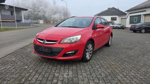 Red Opel Astra 2014 in Jurbarkas, with an engine capacity of 1.96 L and mileage of 243 thousand km for 3700 €, photo 2 on AUTOMOTO.COM.LV