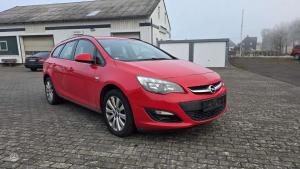 Red Opel Astra 2014 in Jurbarkas, with an engine capacity of 1.96 L and mileage of 243 thousand km for 3700 €, photo 3 on AUTOMOTO.COM.LV