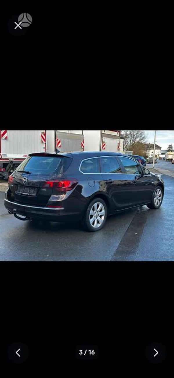 Red Opel Astra 2014 in Vilnius, with an engine capacity of 1.96 L and mileage of 192 thousand km for 5300 €, photo 2 on AUTOMOTO.COM.LV